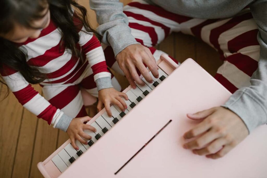 How to Teach Piano to Kids (So They Love It)